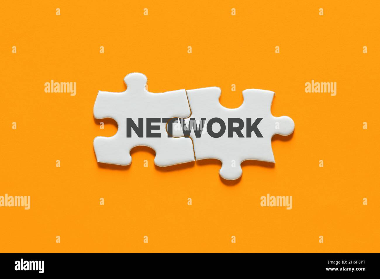 Connected puzzle pieces with the word network. Connection ...