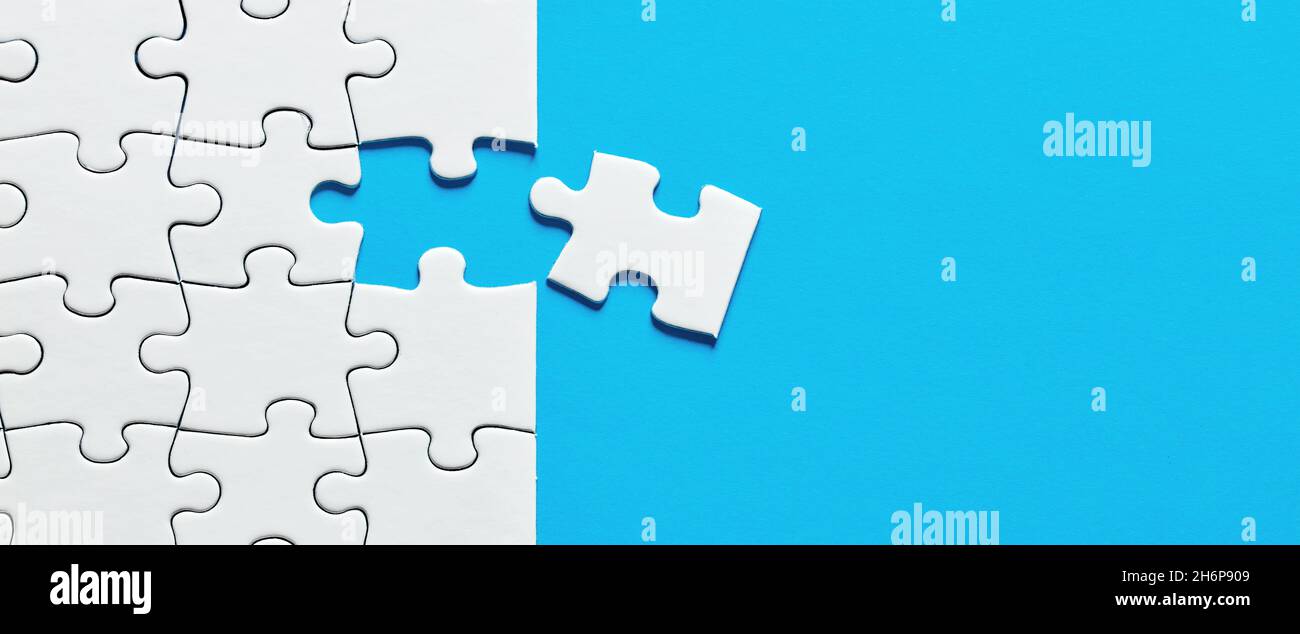 One missing puzzle piece with blue background with copy space Stock ...