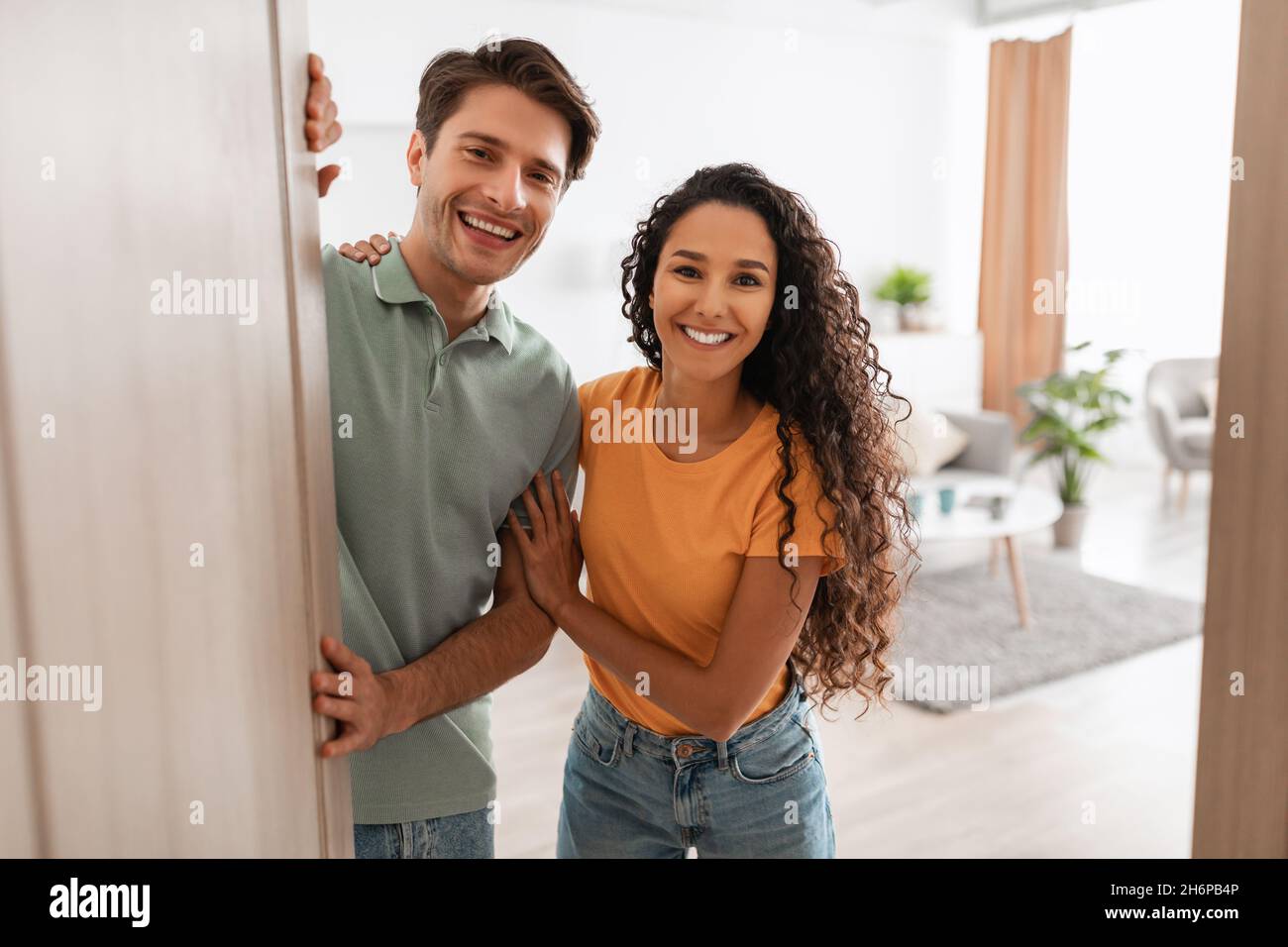 Man woman female couple entering front entrance hi-res stock ...