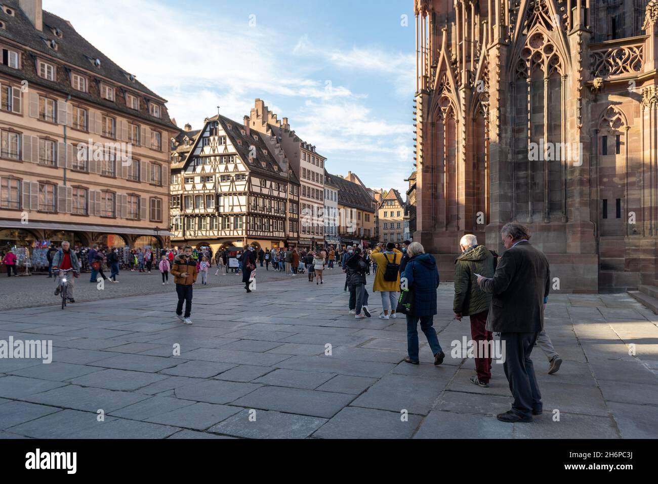 View along the pedestrian street of the historic center of Strasbourg ...