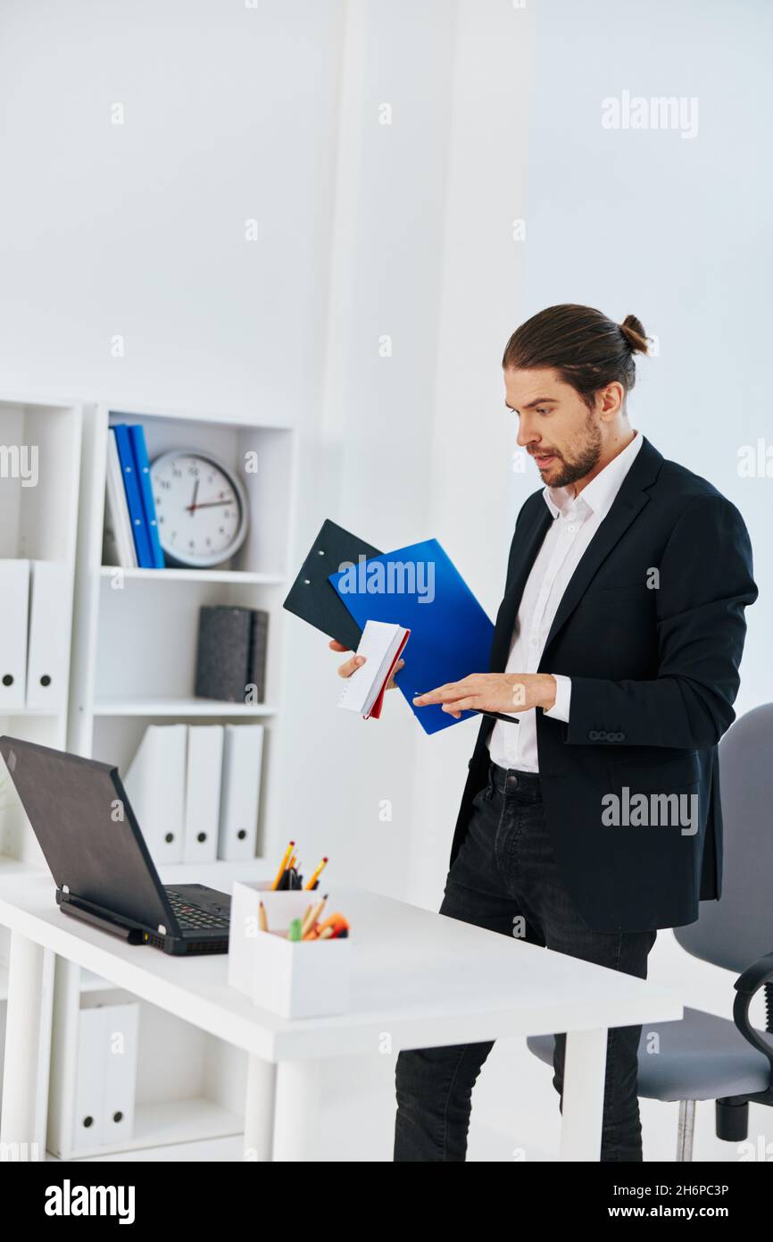 Man workflow in the office documents emotions technology Stock Photo ...