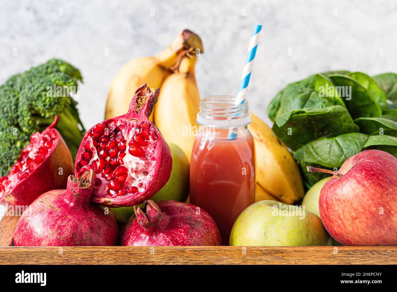 Healthy diet food and smoothie in wooden tray Stock Photo - Alamy