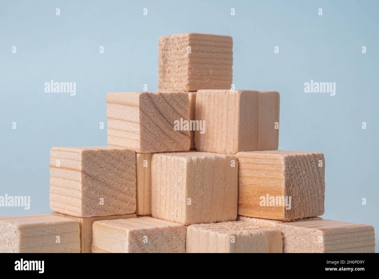 Wooden cubes without icons on a blue background Stock Photo - Alamy
