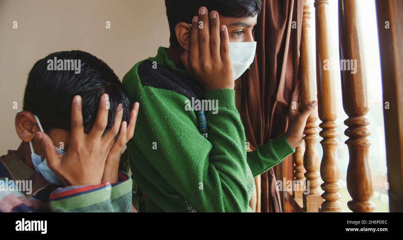 Kids looking out of the window with shocked looks on their faces Stock ...