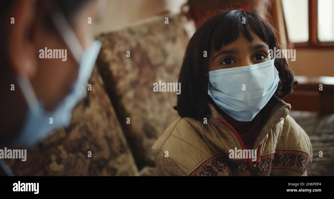 Little girl wearing a face mask Stock Photo - Alamy