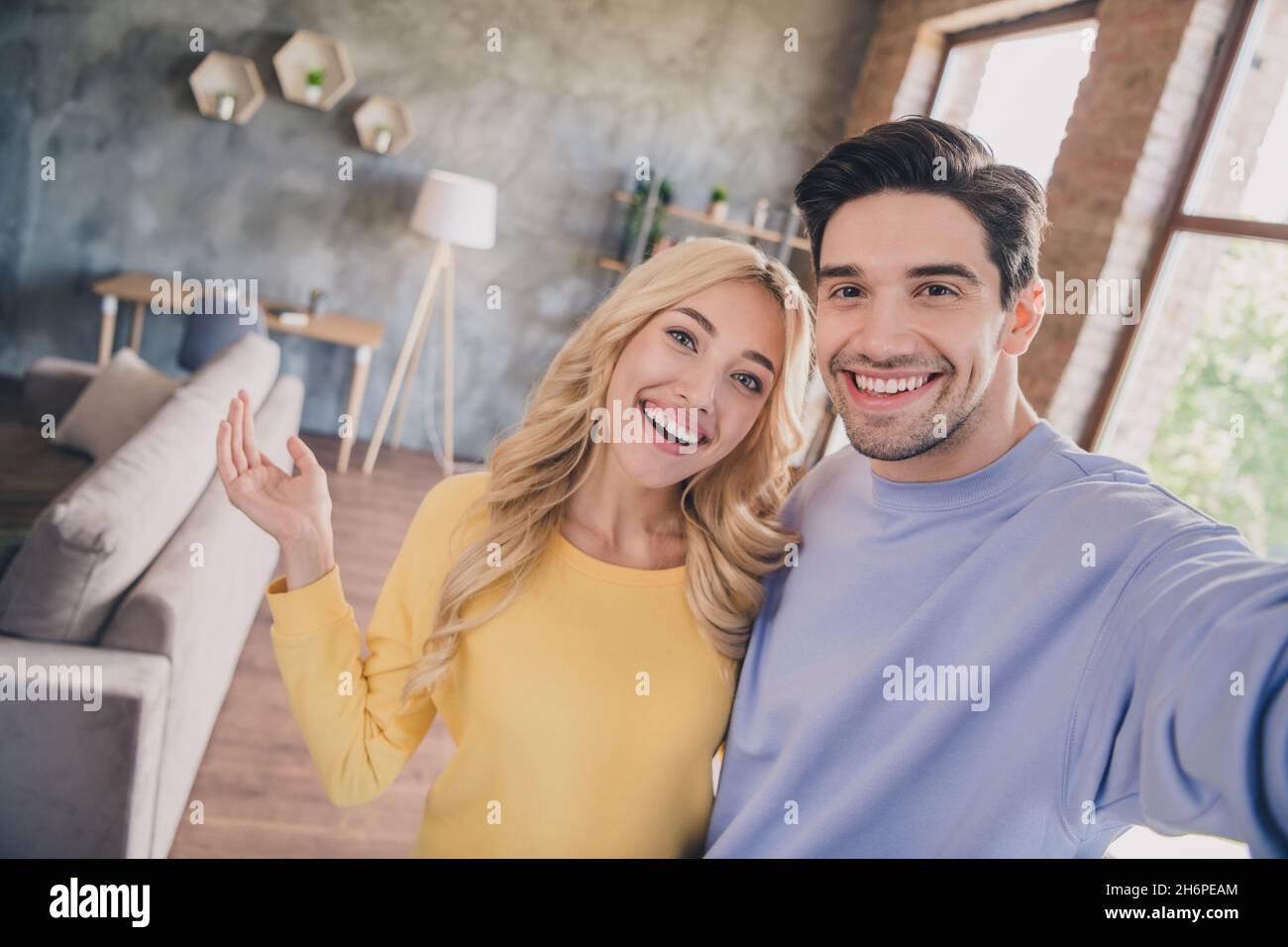 Self-portrait of attractive cheerful couple spending vacation weekend ...