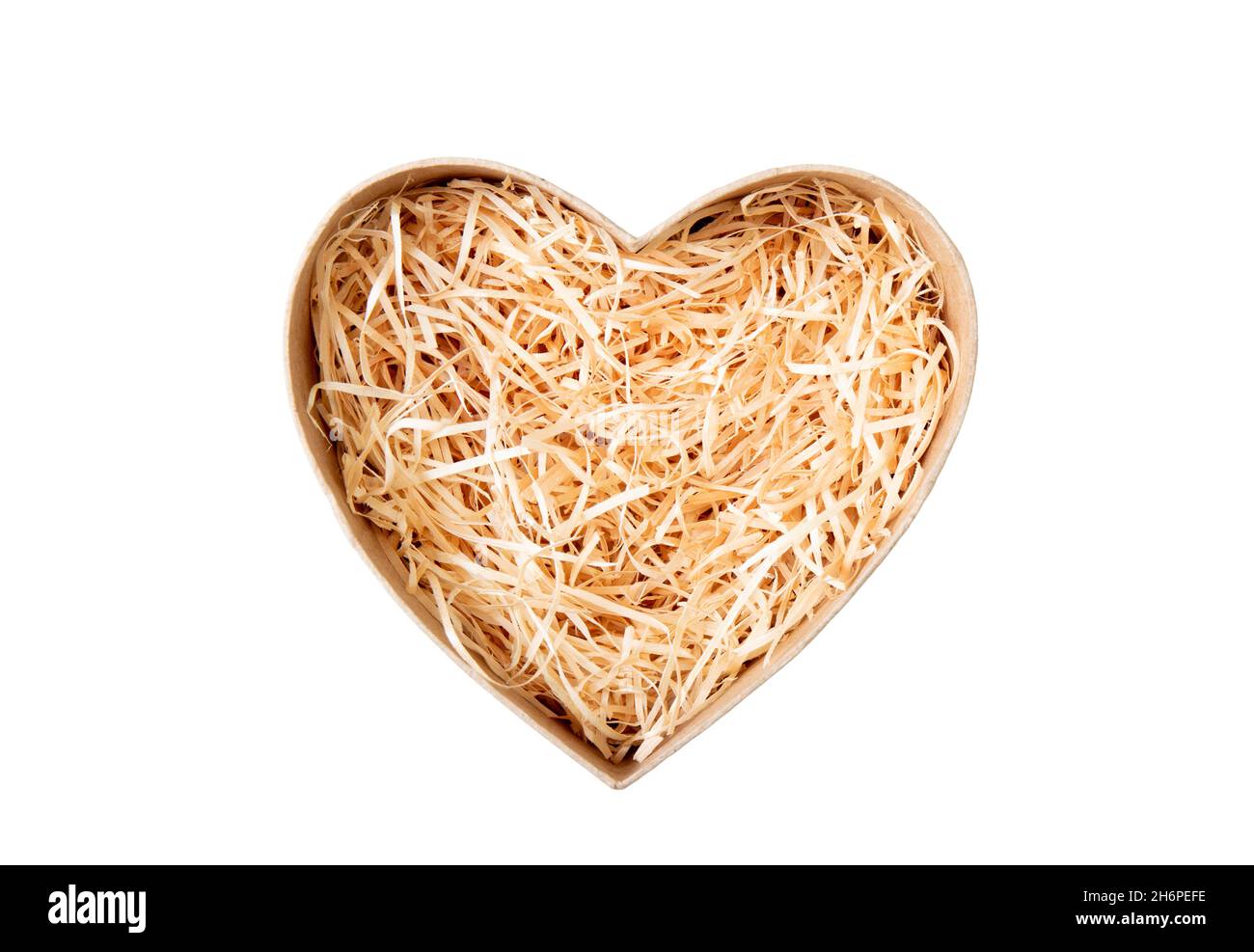 Top view of natural color open heart shape cardboard box with shredded ...