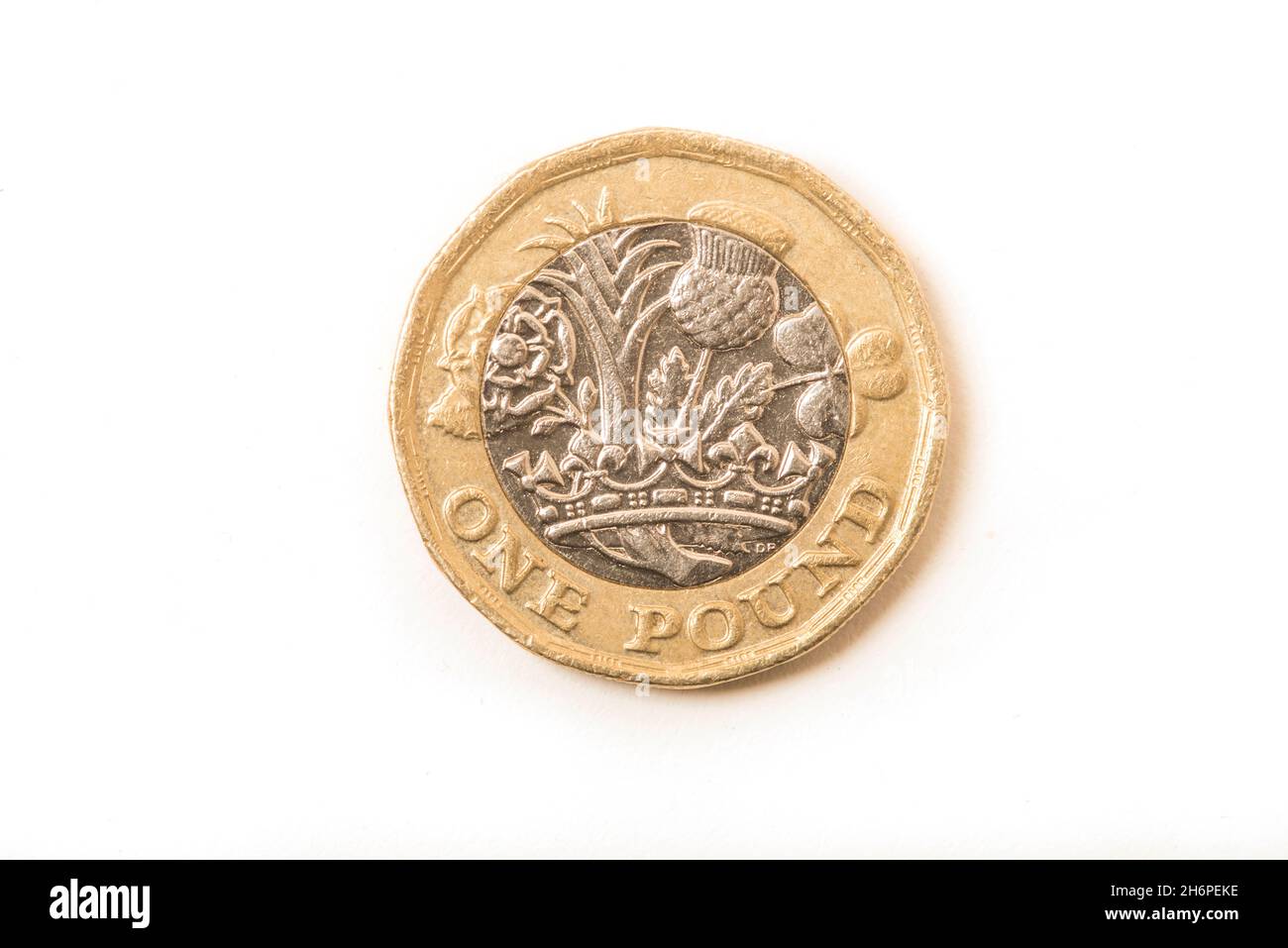 Money: Close up of a One pound coin. Pound Sterling currency on white ...