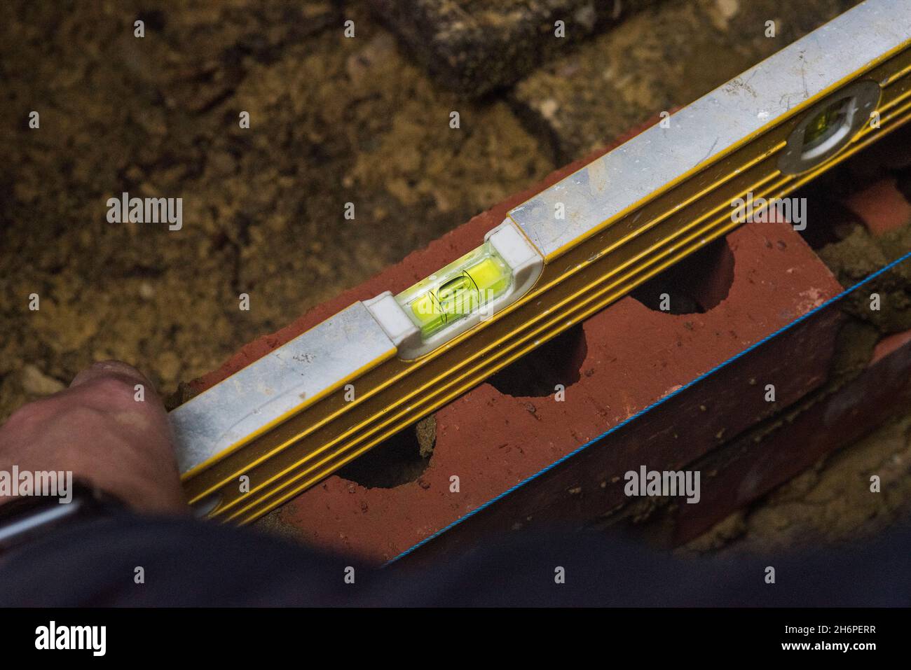 Bricklaying engineering bricks. Occupation: Bricklayer. Construction ...