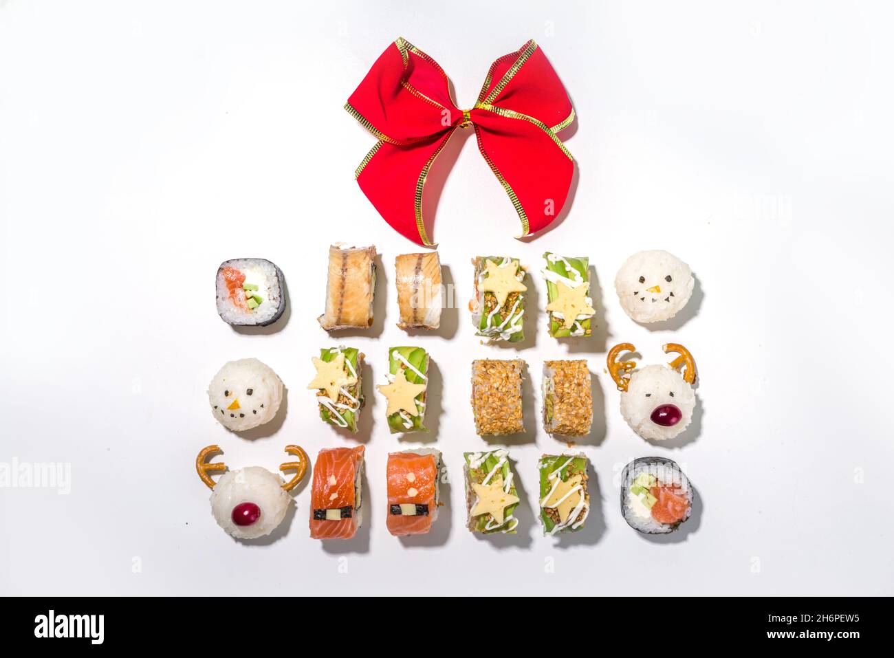 Christmas sushi set with funny decorated rolls like Xmas symbols ...