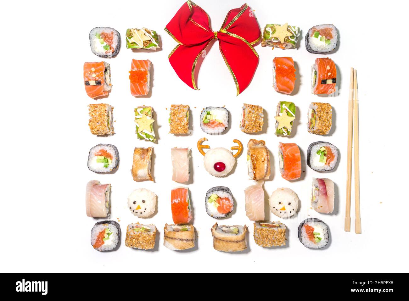 Christmas sushi set with funny decorated rolls like Xmas symbols ...