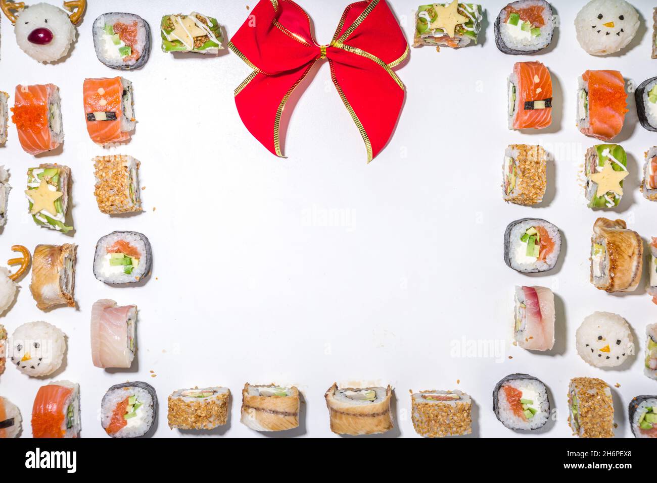 Christmas sushi set with funny decorated rolls like Xmas symbols ...