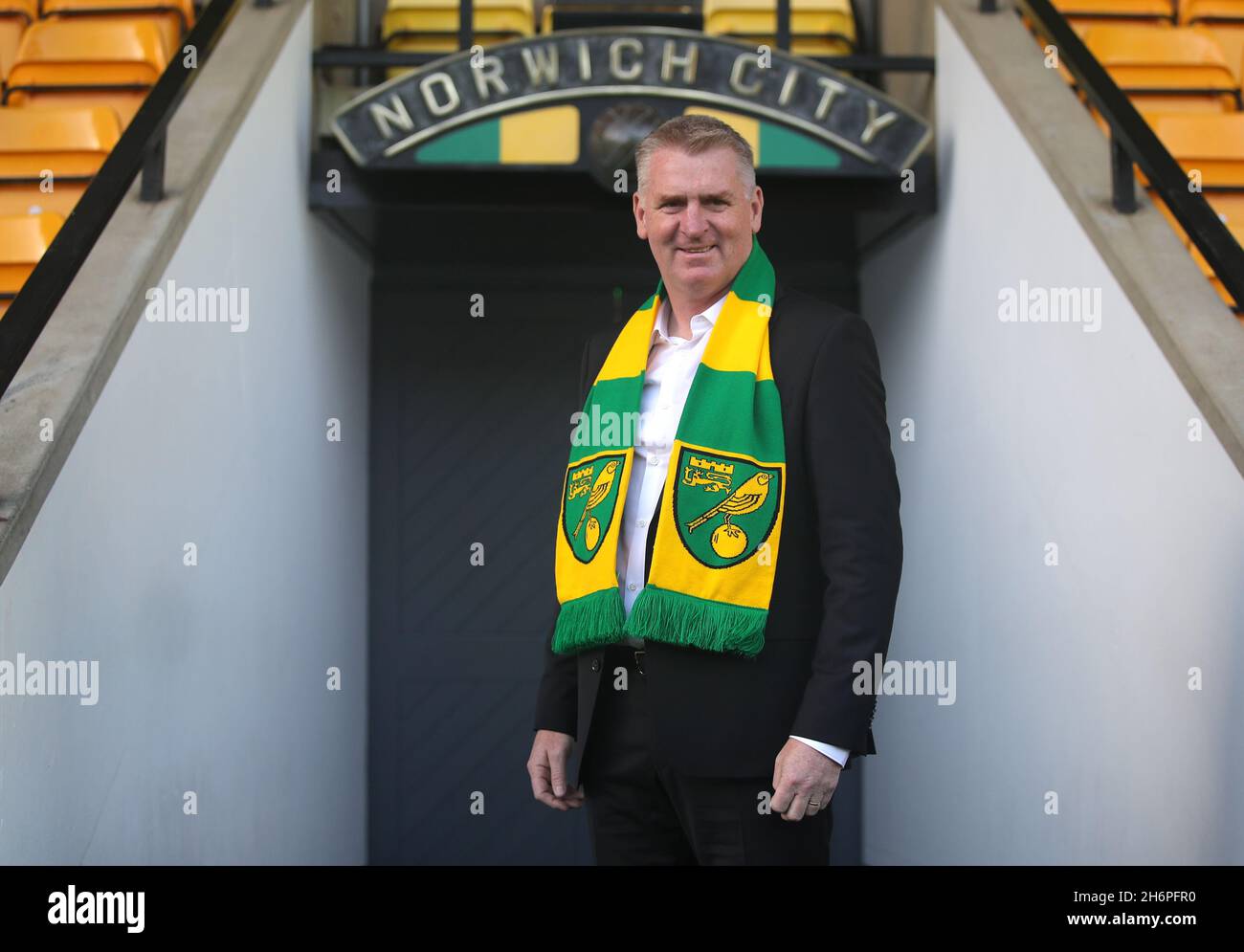 Norwich City's new manager Dean Smith wears a scarf pitch-side after a ...