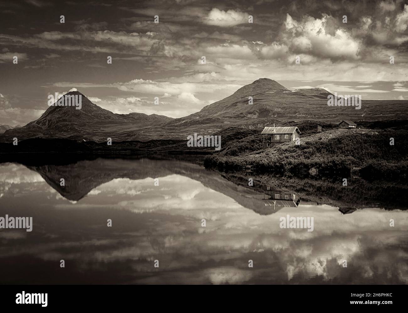 Cabin and reflection in Tangle Lake, Alaska Stock Photo - Alamy
