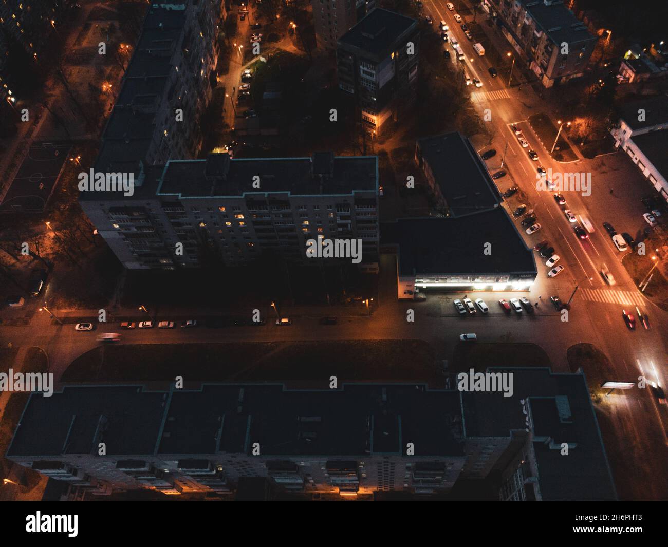 Aerial night city streets with lights illumination top flight in Europe ...