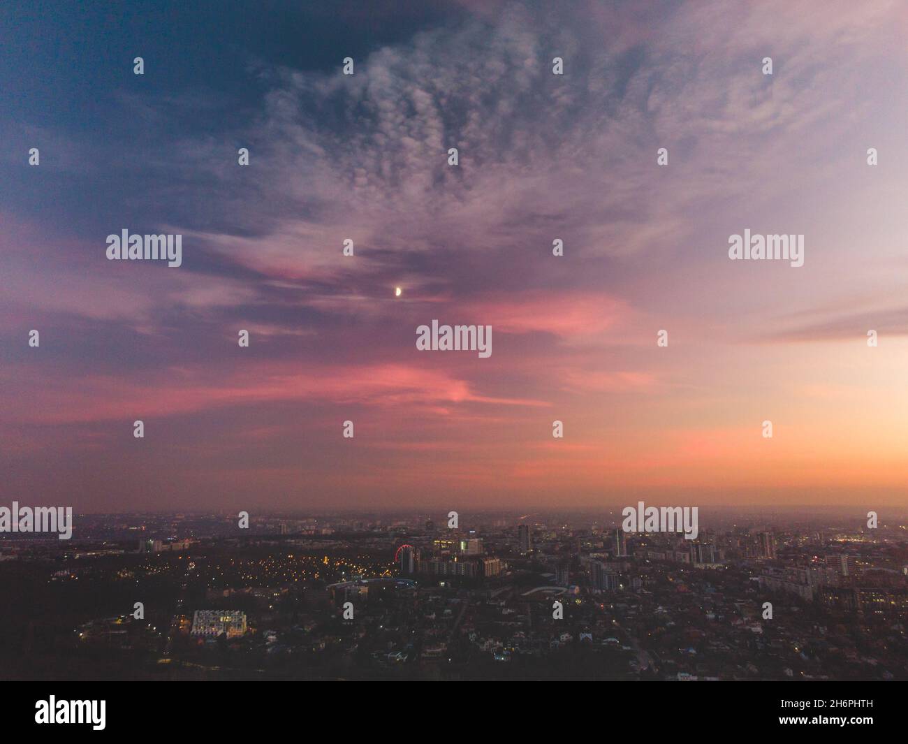 Aerial colorful purple sunset view with epic skyscape. Kharkiv city ...