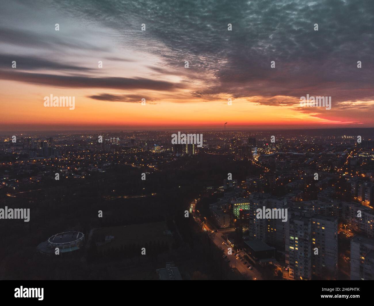 Aerial vivid sunset dark view with epic skyscape. Kharkiv city center ...