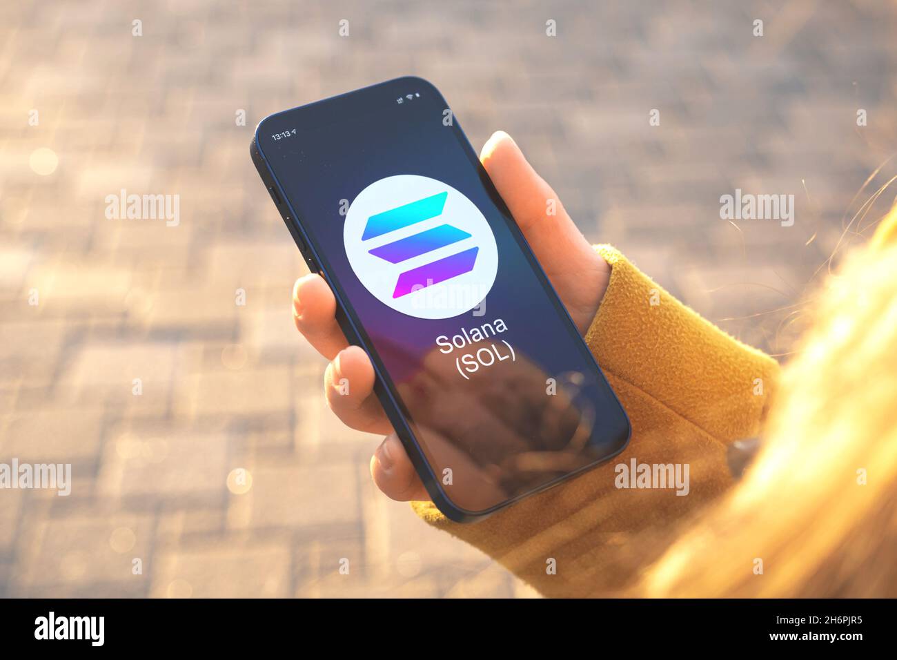 Solana SOL cryptocurrency symbol. Business and financial concept. Hand ...