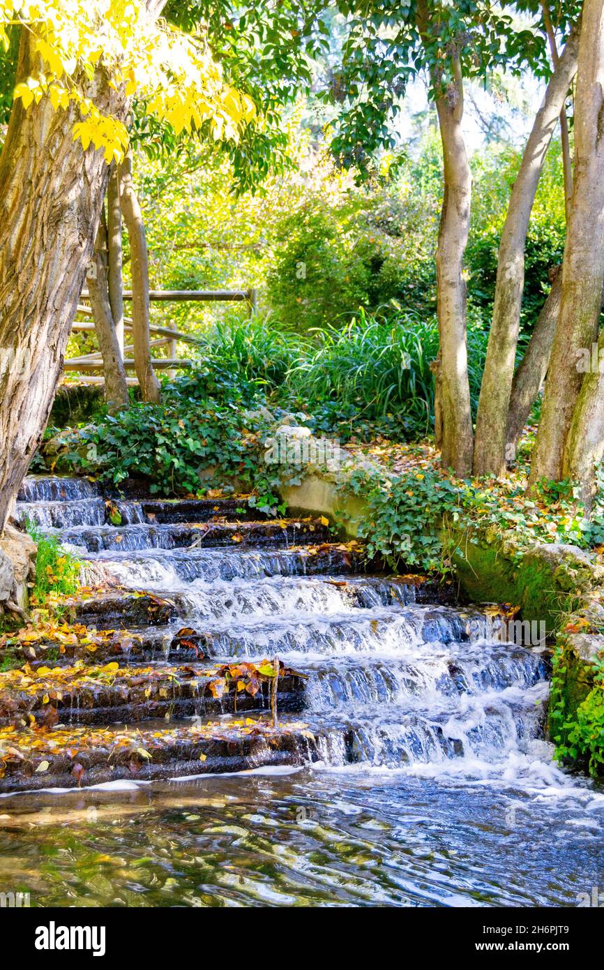 River-stream passing through Parque del Oeste, Madrid park with some ...