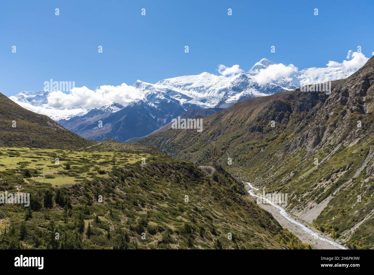Aerial view of a road in between the mountains Stock Photo - Alamy