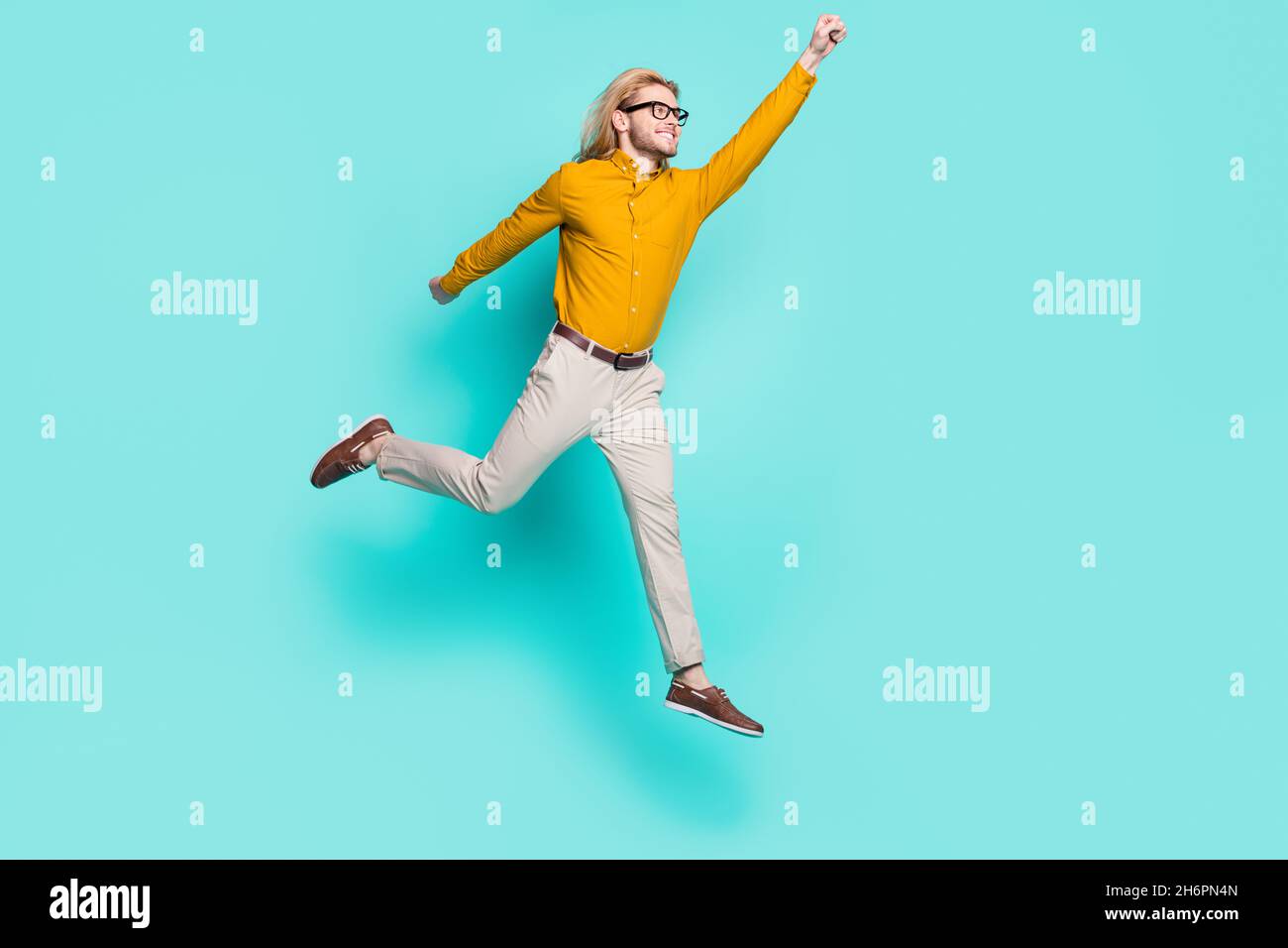 Full length profile side photo of young man happy positive smile jump ...