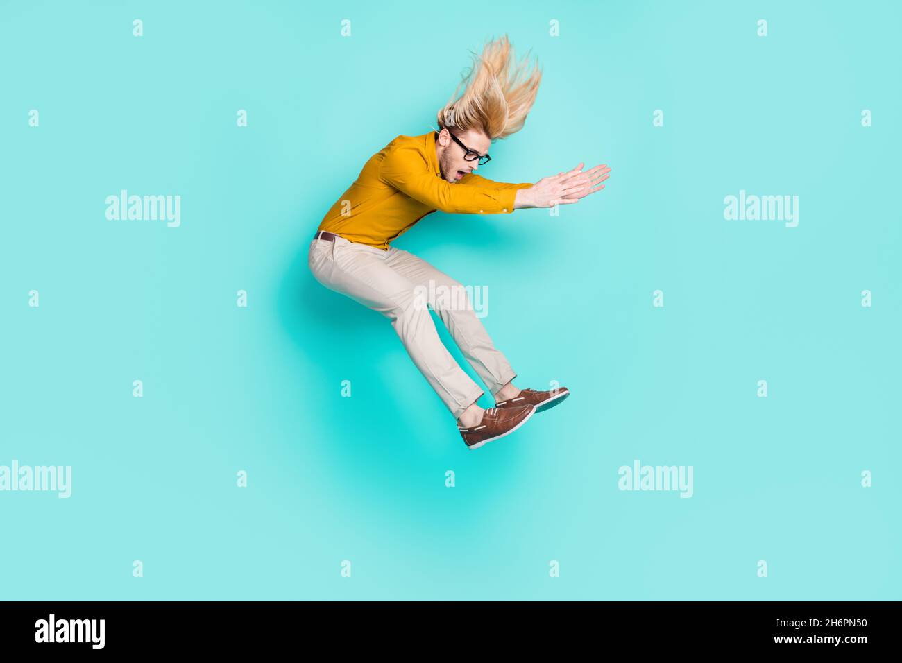 Full length profile side photo of young man jump up amazed shocked ...