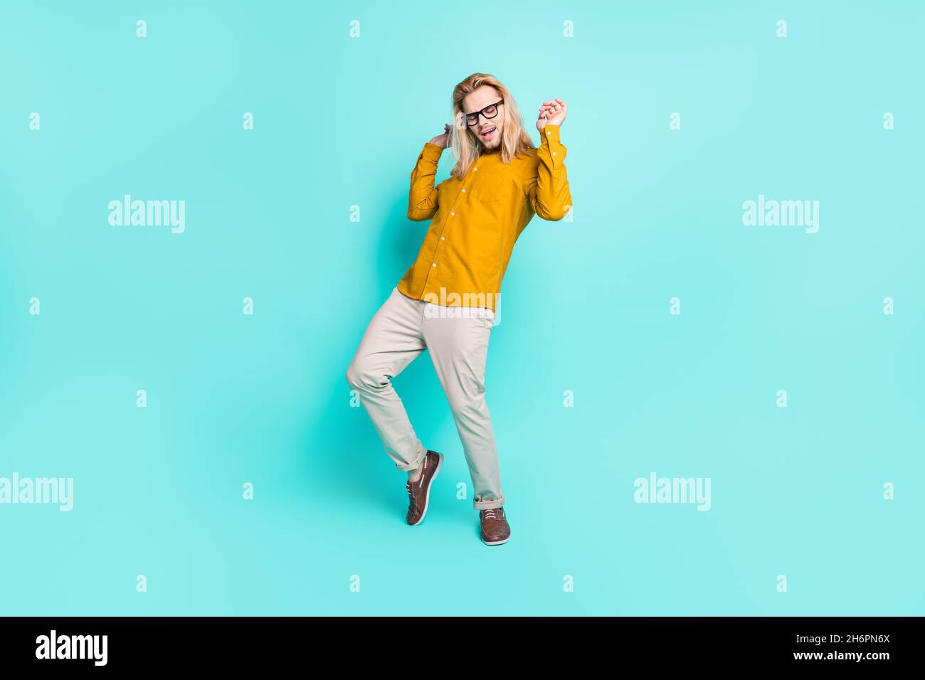 Full size photo of young handsome man have fun dance party enjoy ...