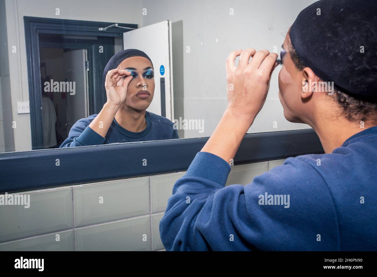 Male drag queen dressing up in preparation for a performance Stock ...