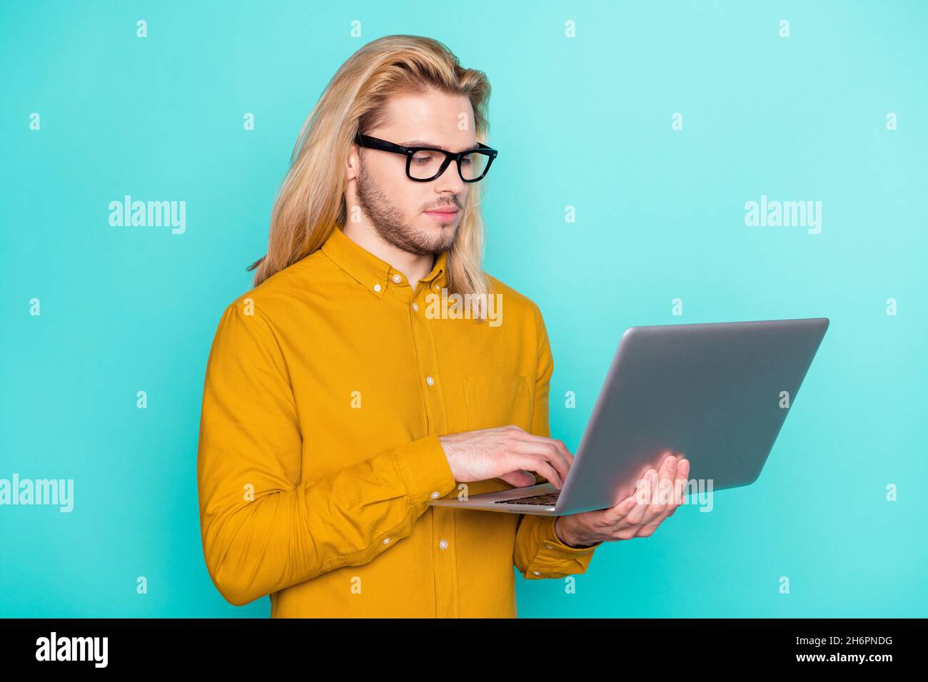 Photo of young guy focused look read chat type email laptop work ...