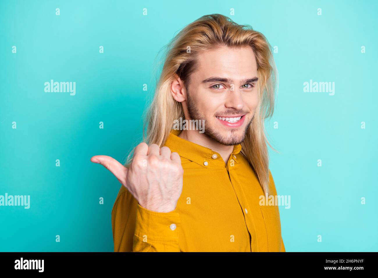 Profile side photo of young man happy positive smile show thumb empty ...
