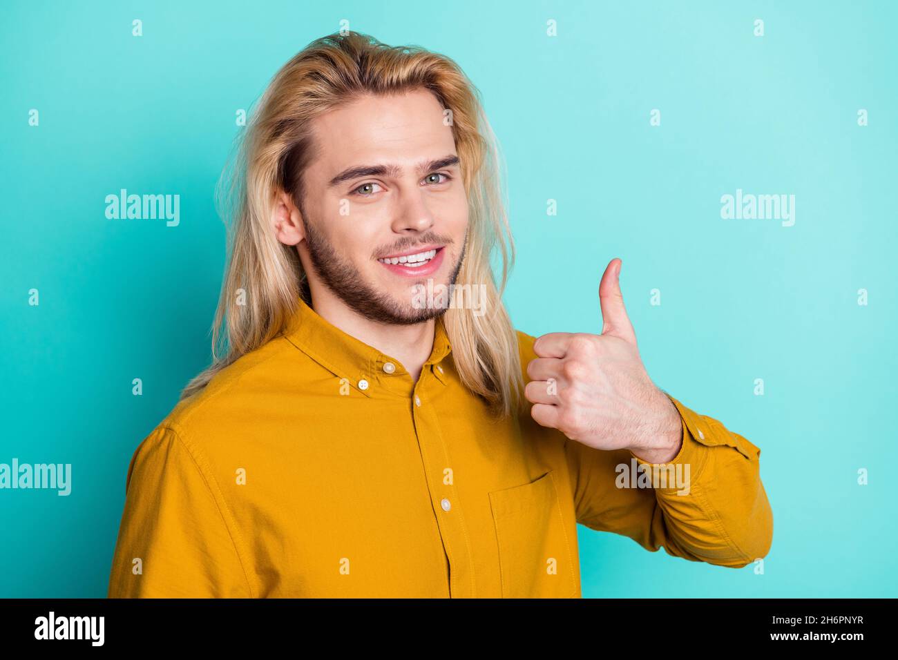 Photo of young handsome man happy positive smile show thumb-up like ...