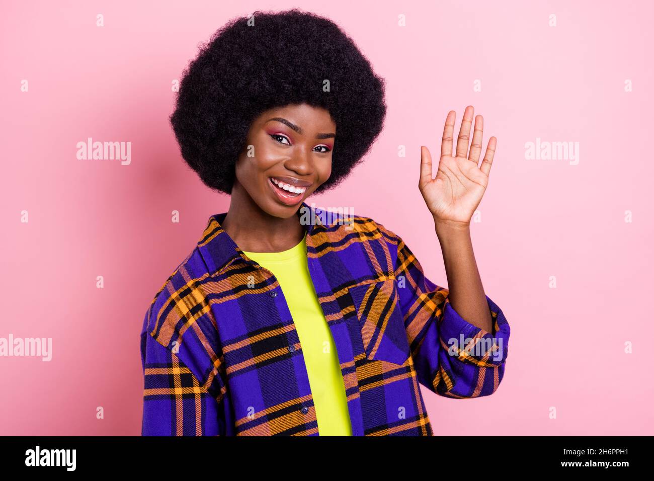 Portrait of attractive cheerful girl waving you hi hello greetings ...