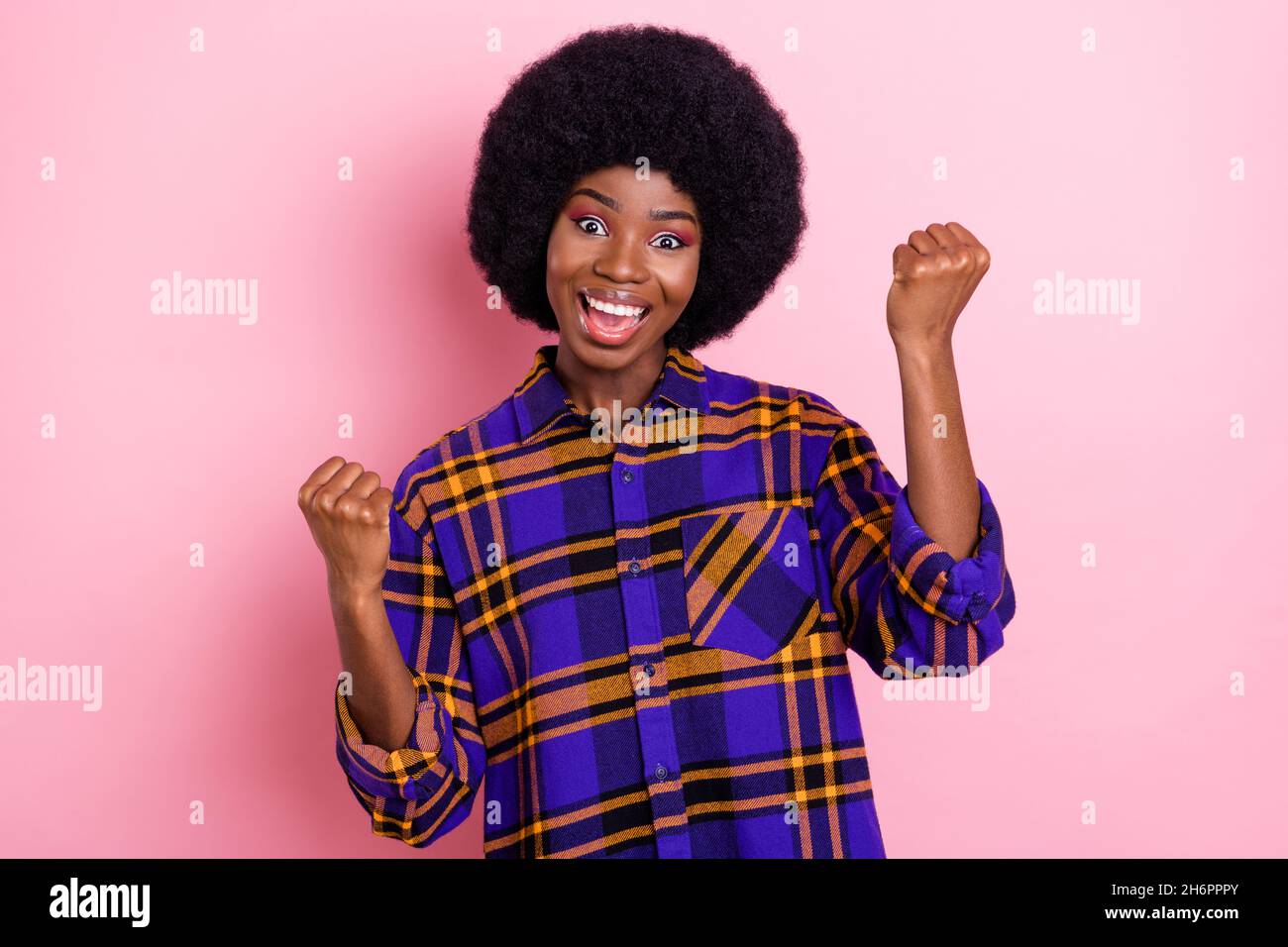 Portrait of attractive cheerful girl rejoicing having fun attainment ...