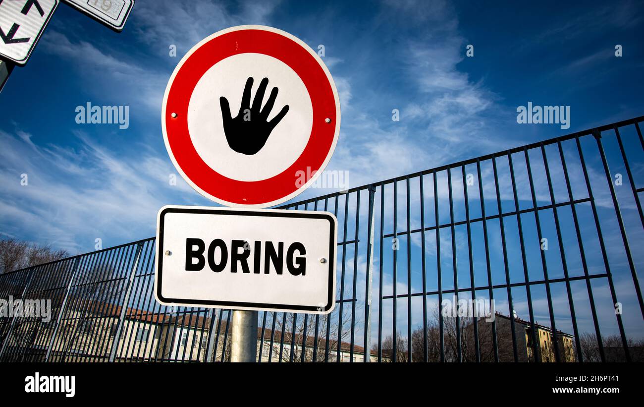 Street Sign the Direction Way to Exciting versus Boring Stock Photo - Alamy