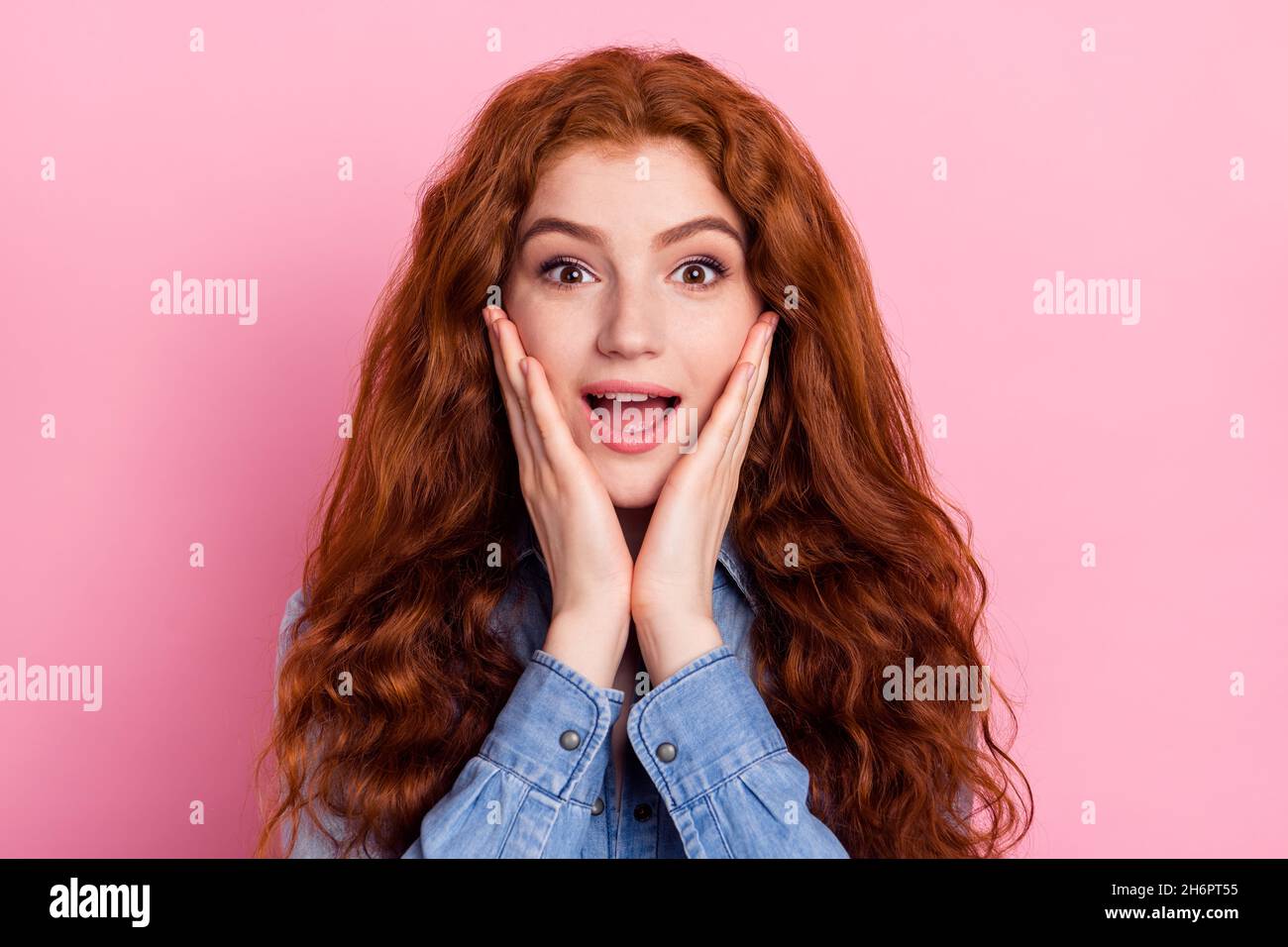 Photo of young girl happy positive smile amazed surprised hands touch ...