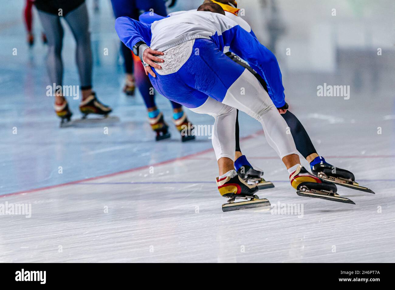 back men speed skaters running in ice ring Stock Photo - Alamy