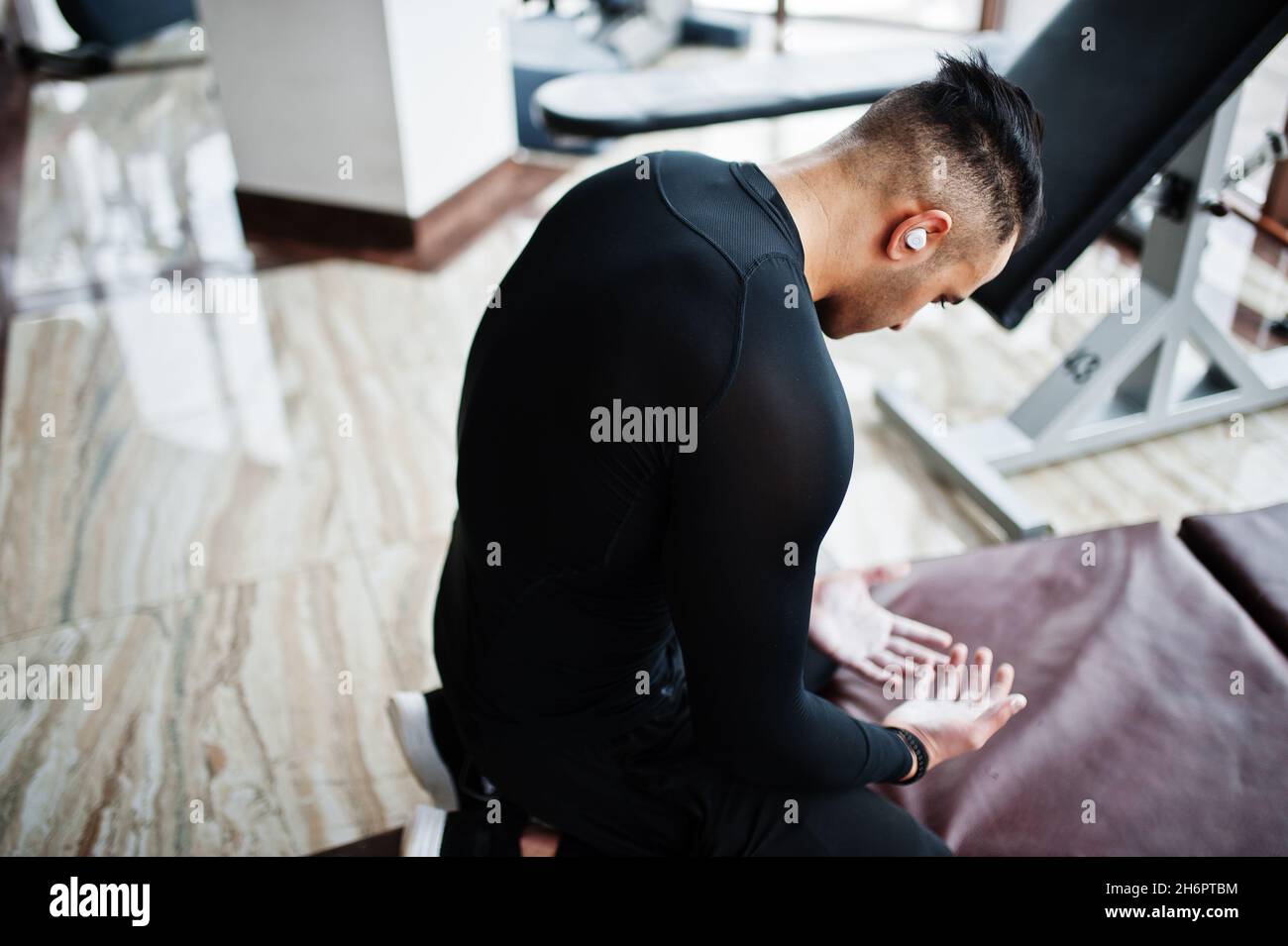 Muscular arab man training in modern gym Stock Photo - Alamy
