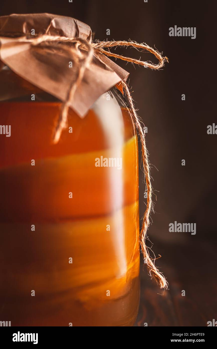 kombucha with layers in a large three-liter jar. organic healthy drink ...