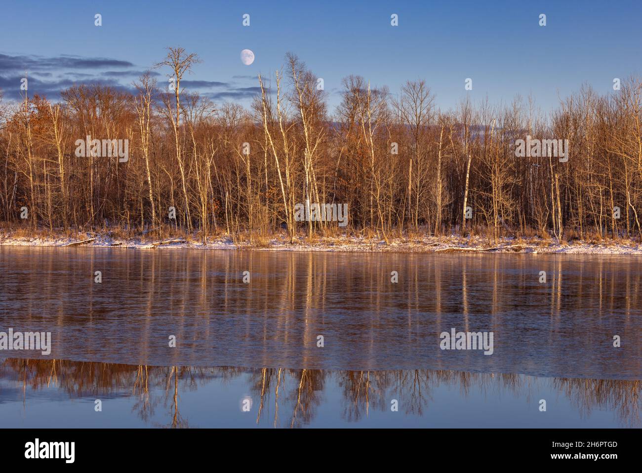 Rising moon over a wilderness lake in northern Wisconsin Stock Photo ...