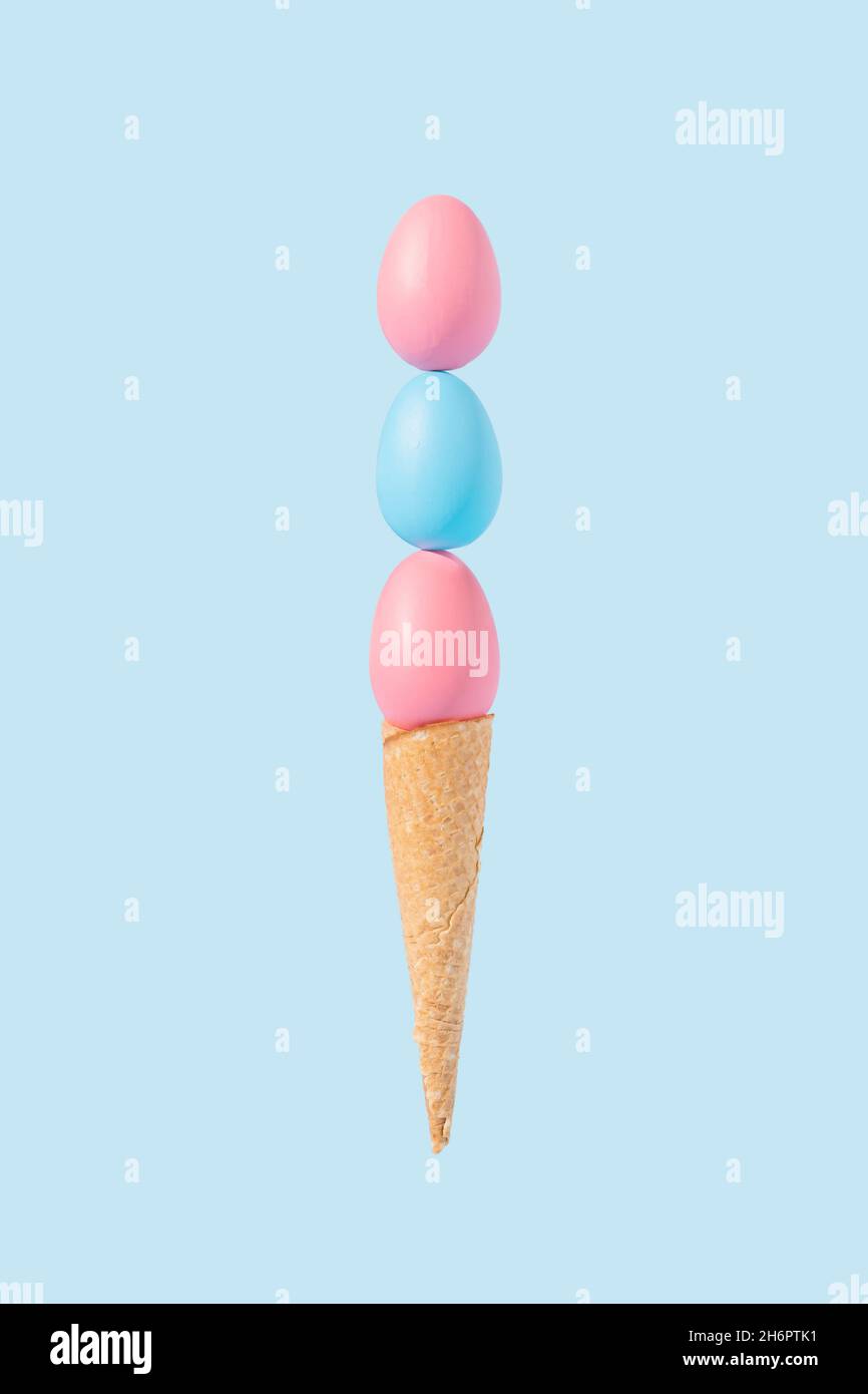 Creative minimal composition made with colorful pastel eggs balancing ...