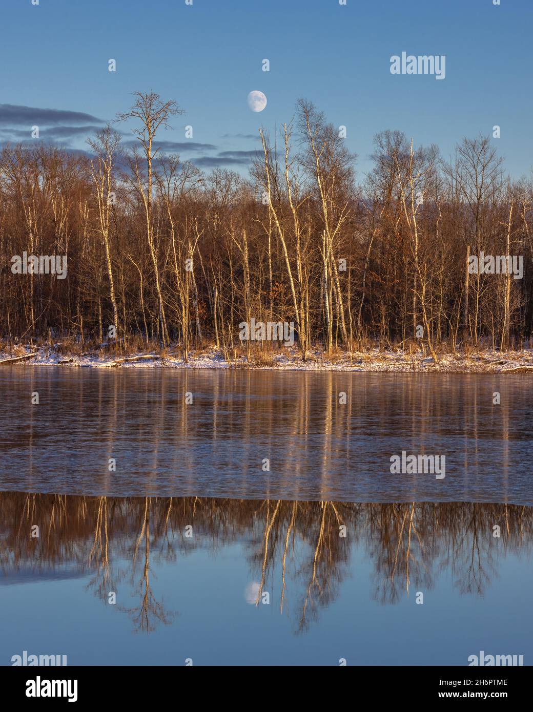 Rising moon over a wilderness lake in northern Wisconsin Stock Photo ...