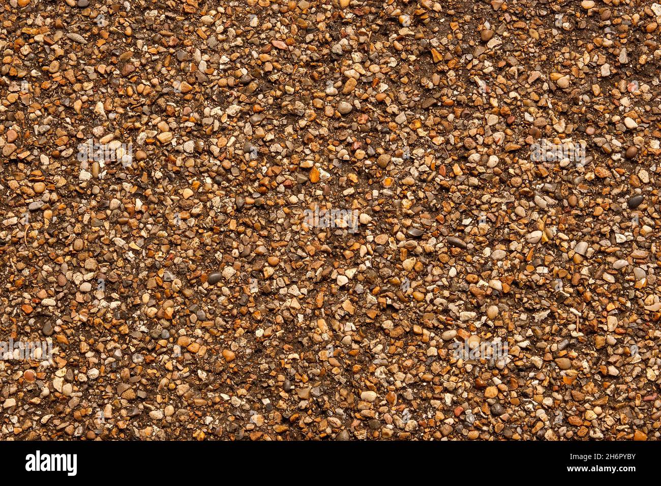 Pea shingle embedded on tar as a durable, non-slip path / road surface ...