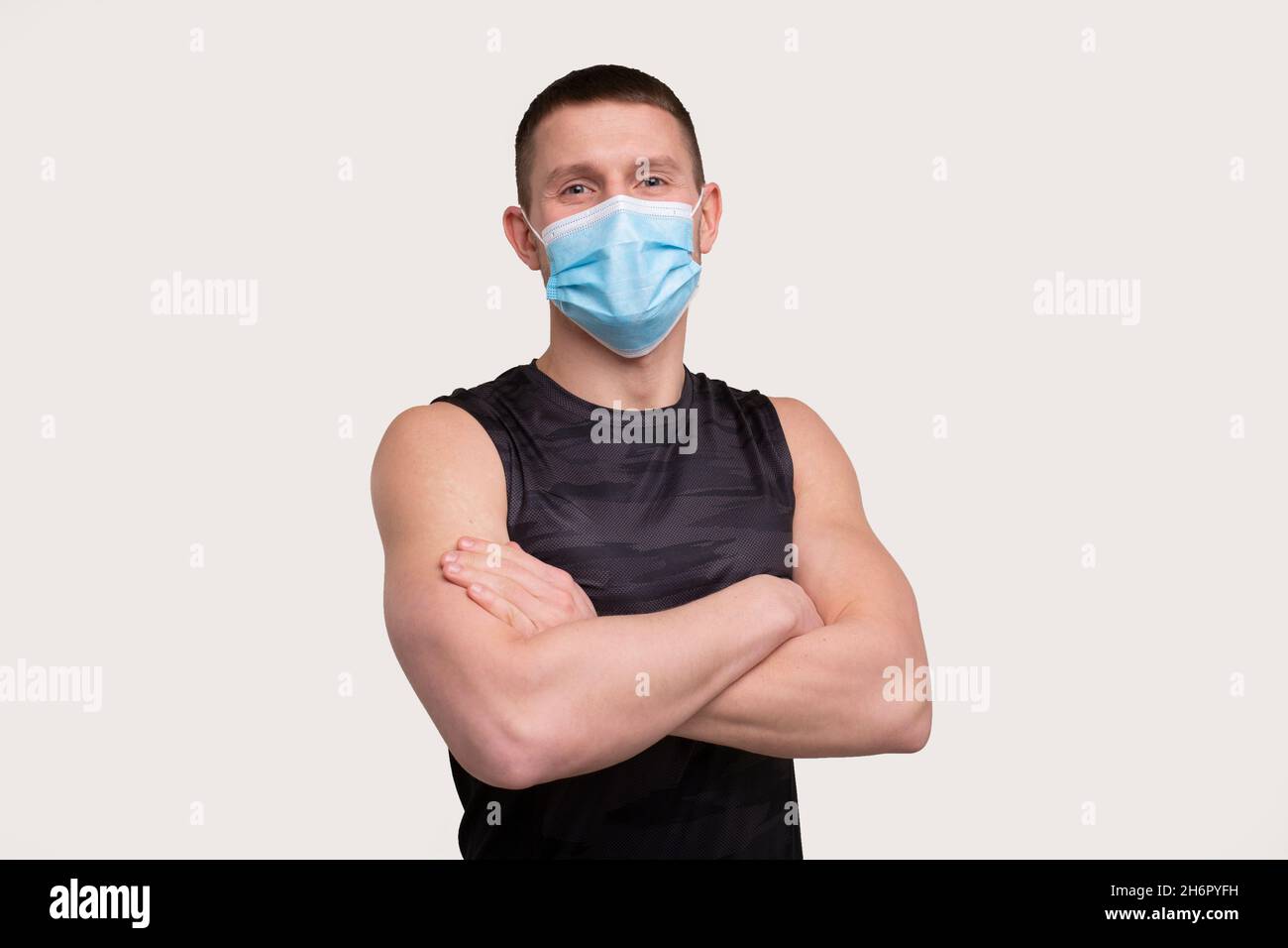 Sportsman Wearing Medical Mask. Man Hands Crossed with Mask. Healthy ...