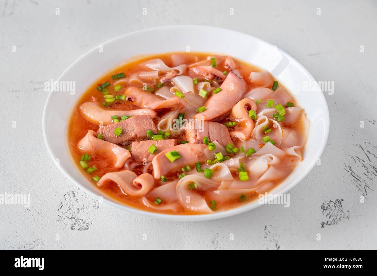 Portion of Yen Ta Fo pink noodle soup Stock Photo - Alamy