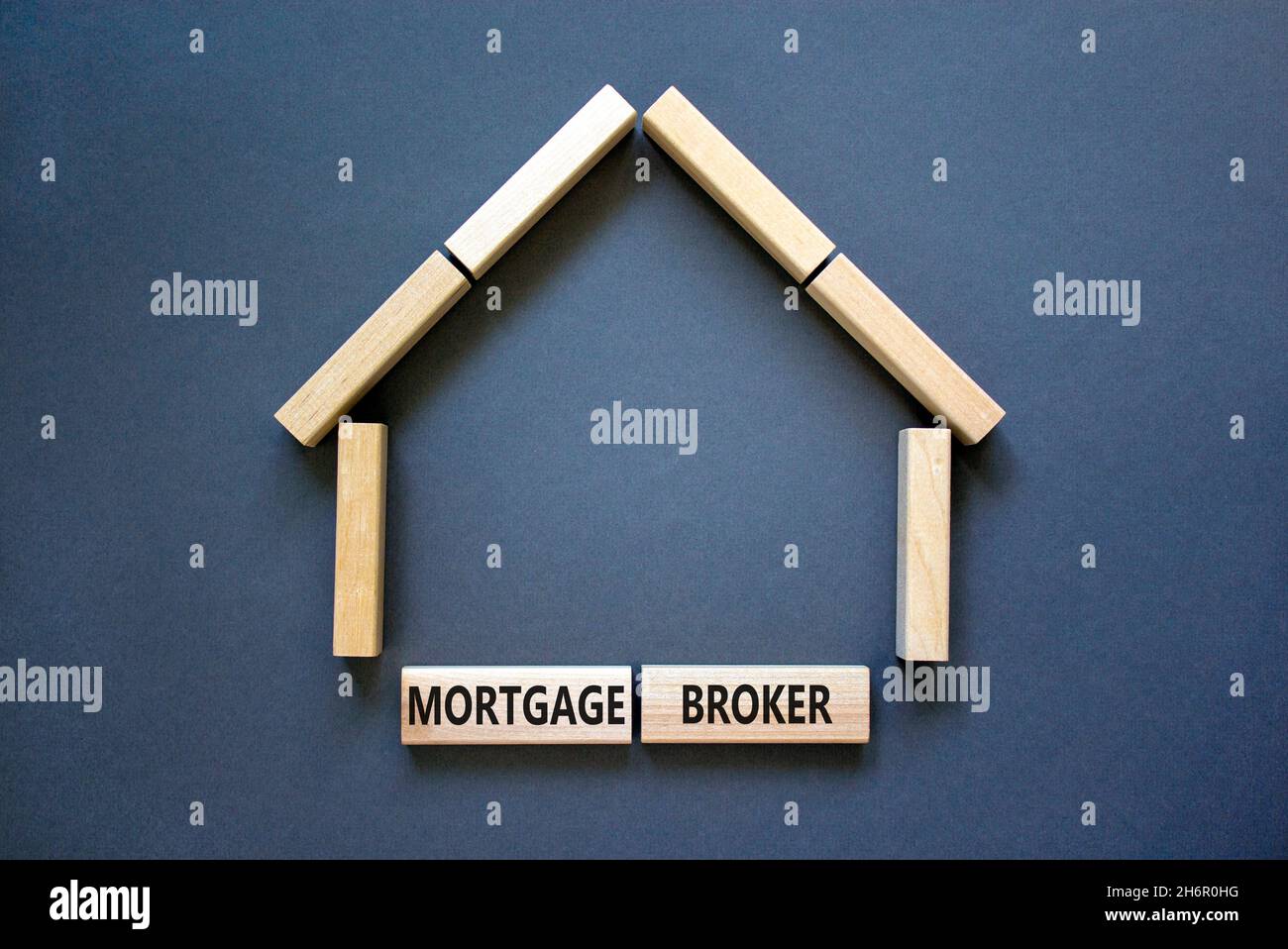 Mortgage broker symbol. Concept words 'Mortgage broker' on wooden ...