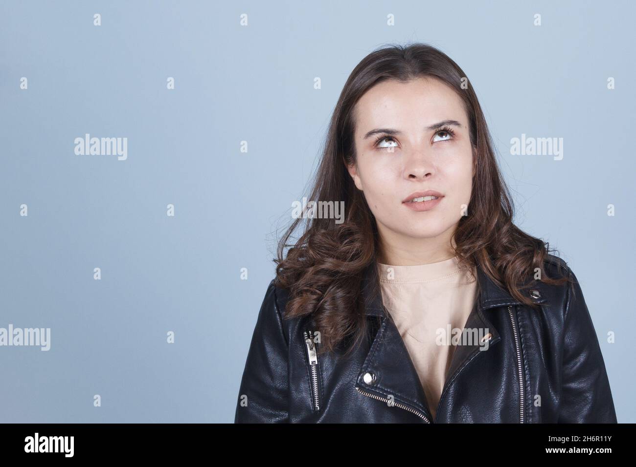 the young lady in the dark jacket is angry Stock Photo - Alamy