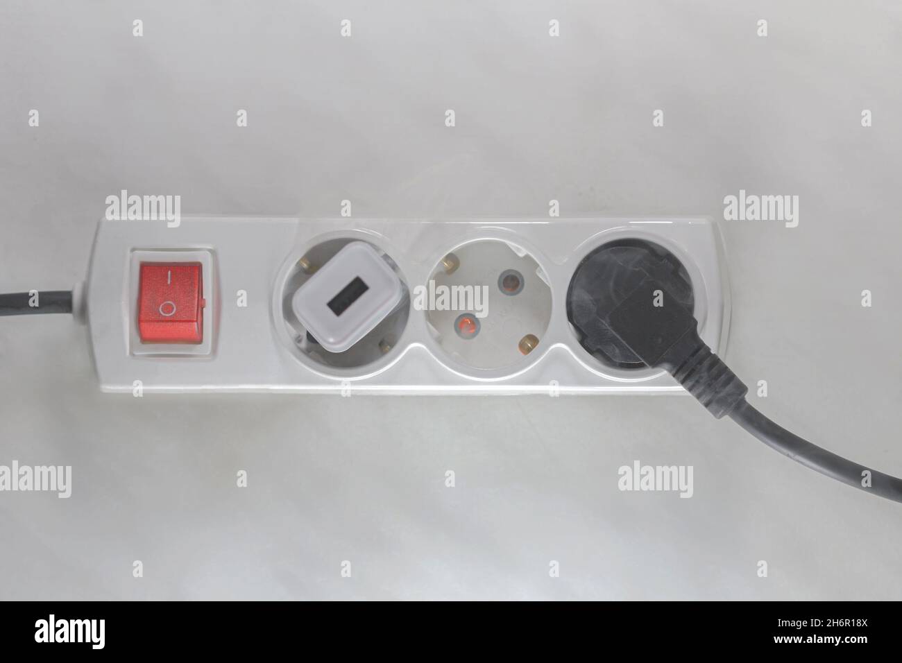 Failure caused by burning of the wire cable and socket outlet plug in ...