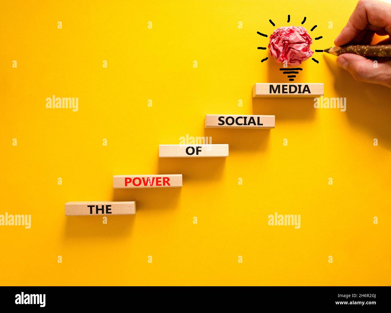 Power of social media symbol. Wooden blocks with words The power of ...