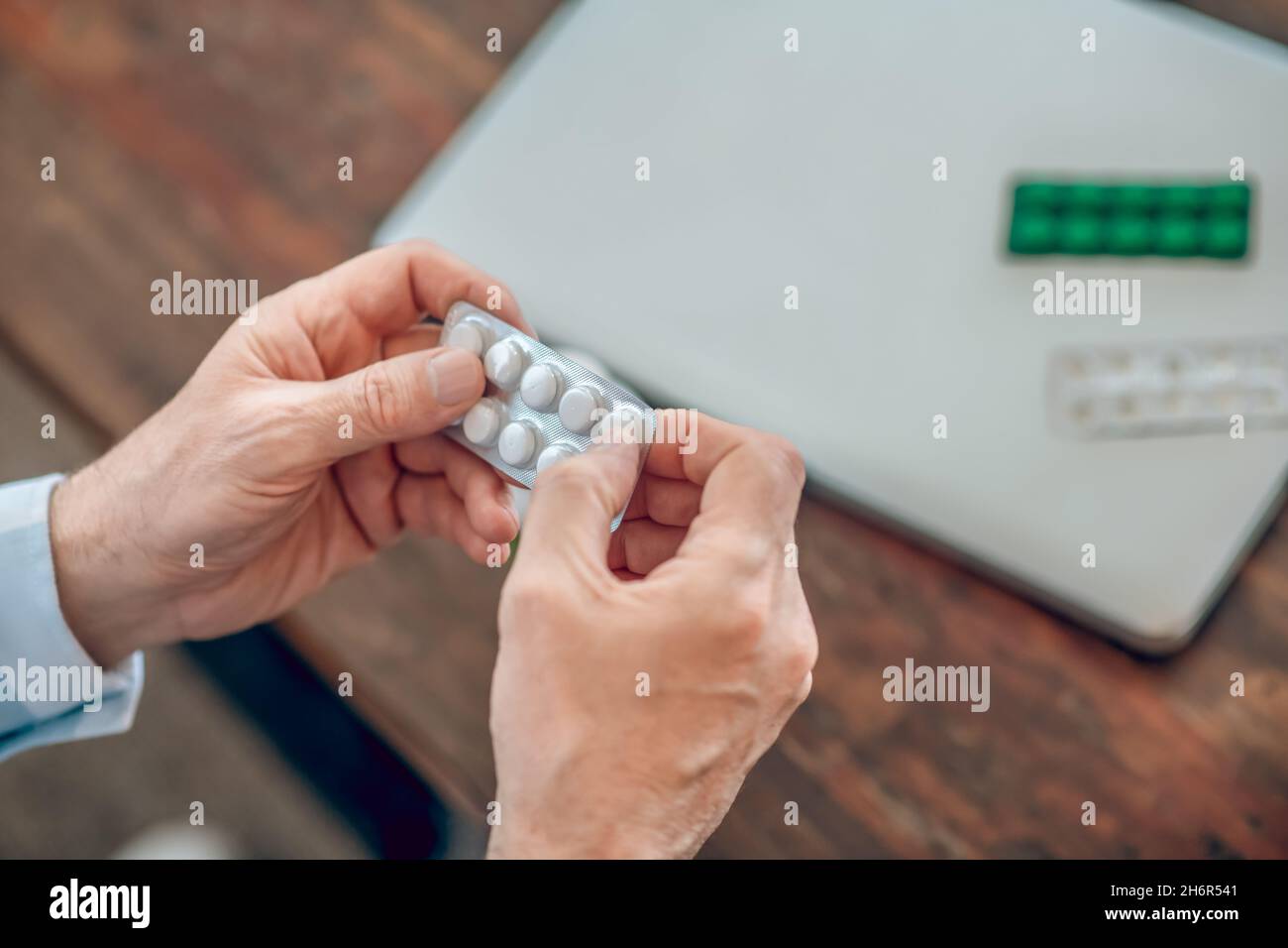 Seated while taking photo hi-res stock photography and images - Alamy