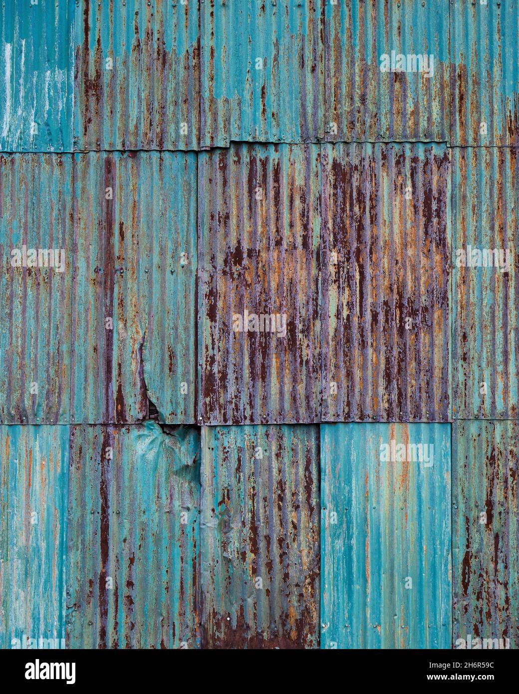 Weathered rusty green metal siding forms background image Stock Photo ...